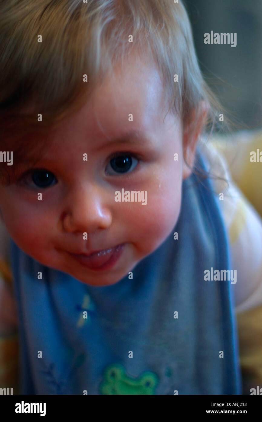 Happy toddler smiles wearing bib Model released and Property released ...