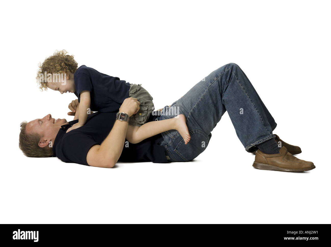 Side profile of a father and his son playing Cut Out Stock Images ...