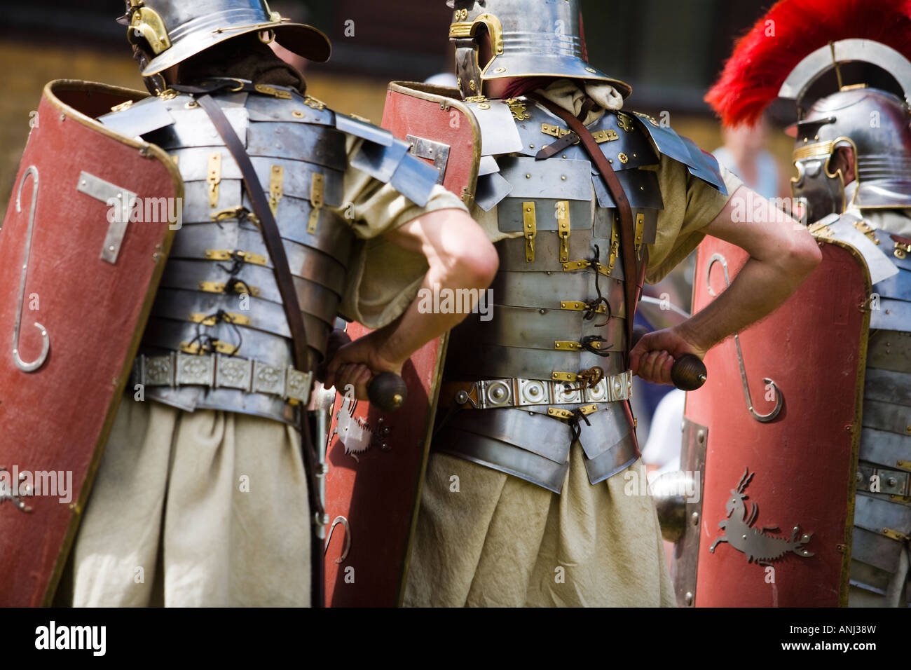 Roman soldiers in formation with shields and weaponry at a Roman army ...