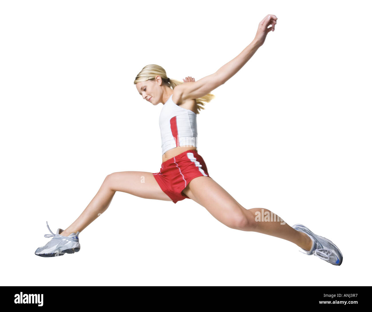 Young woman jumping Stock Photo - Alamy