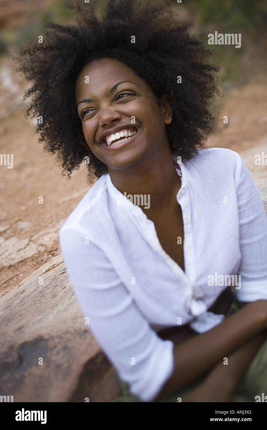 Woman posing with smile Stock Photo - Alamy