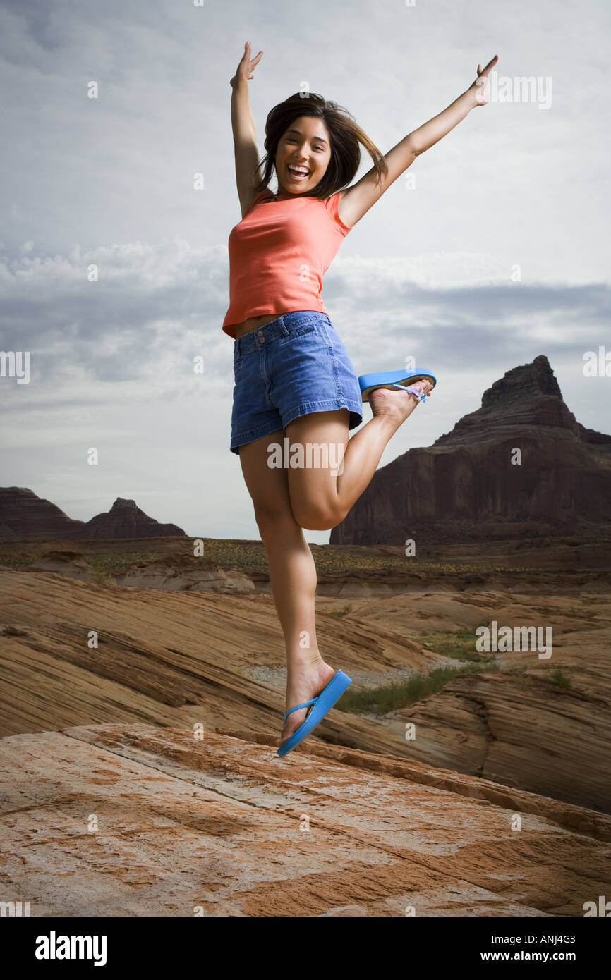 Young woman jumping outdoors Stock Photo - Alamy