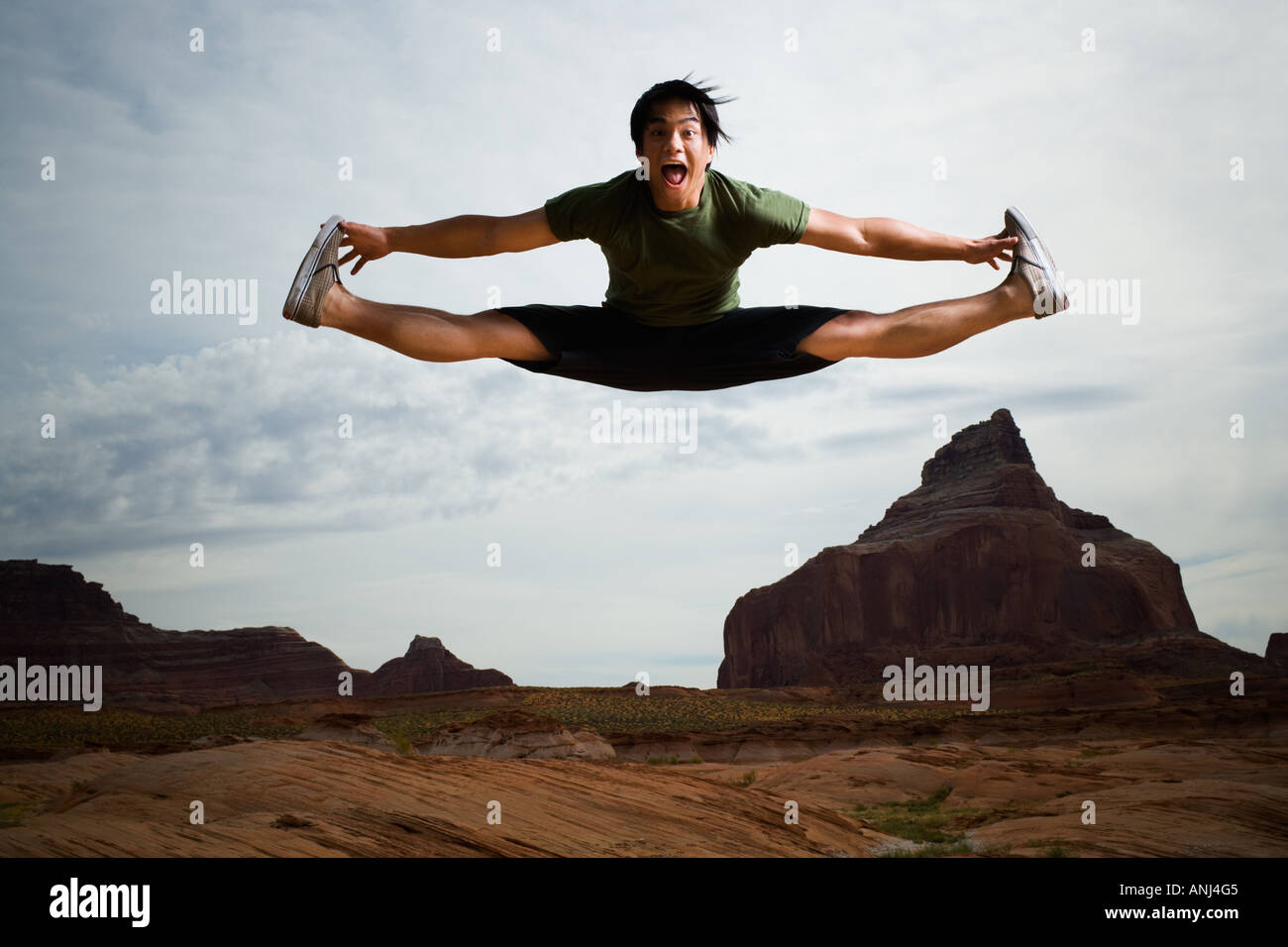 Young man jumping doing splits hi-res stock photography and images - Alamy