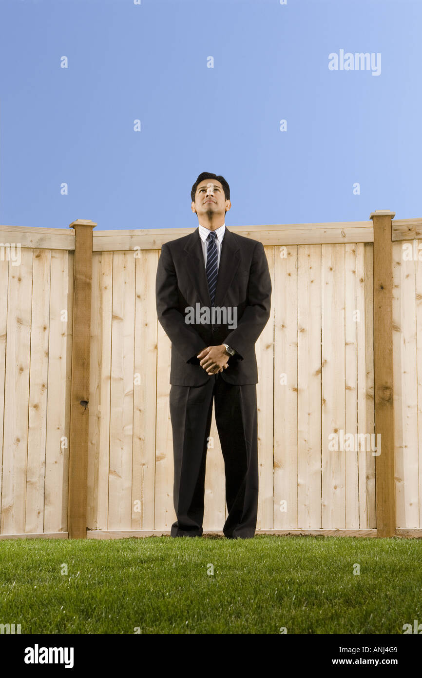 Man standing back low angle hi-res stock photography and images - Alamy