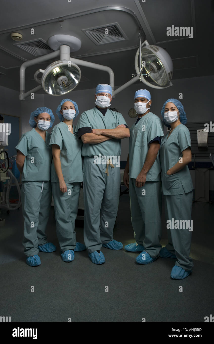 Five surgeons in an operating room Stock Photo - Alamy