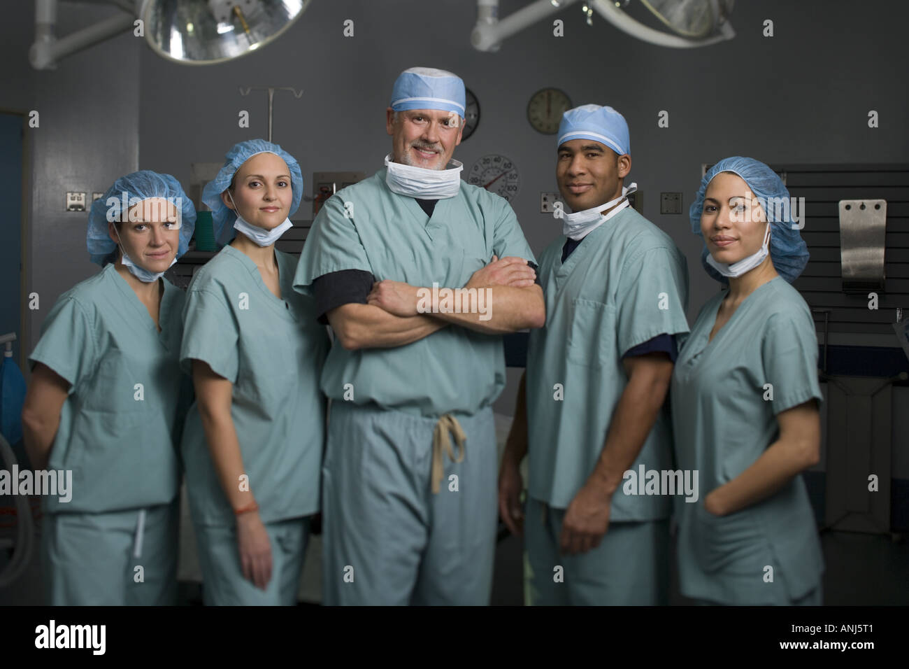 Portrait of five surgeons in an operating room Stock Photo - Alamy