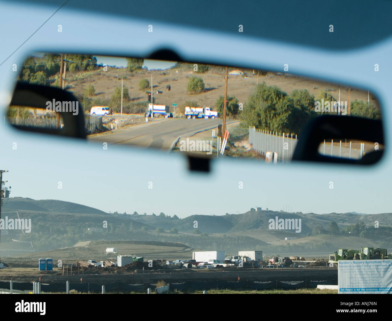 Car views of land for a plant nursery being restructured after flooding ...