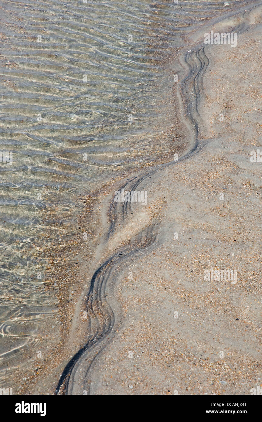 tidal pool ripples and waves on beach shoreline Stock Photo - Alamy