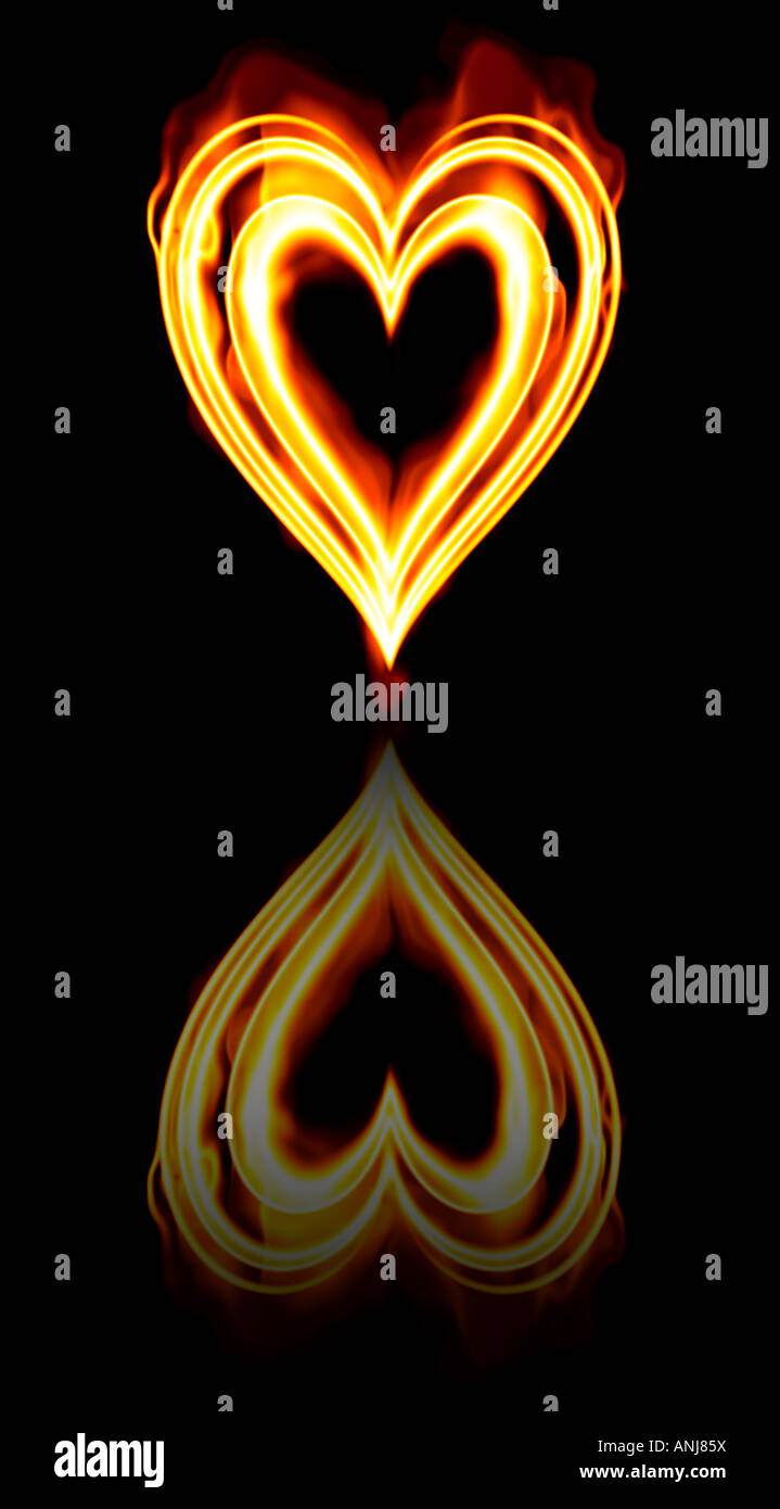 heart on fire to symbolise burning passion and love Stock Photo - Alamy