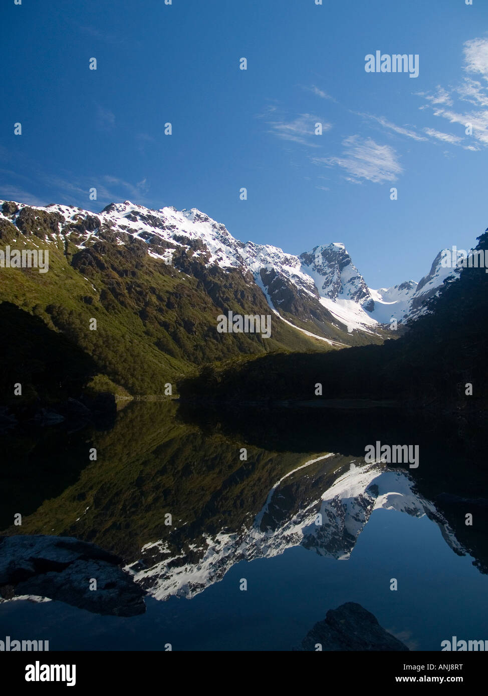 Mountain reflecting in lake Mackenzie on the routeburn track Stock ...