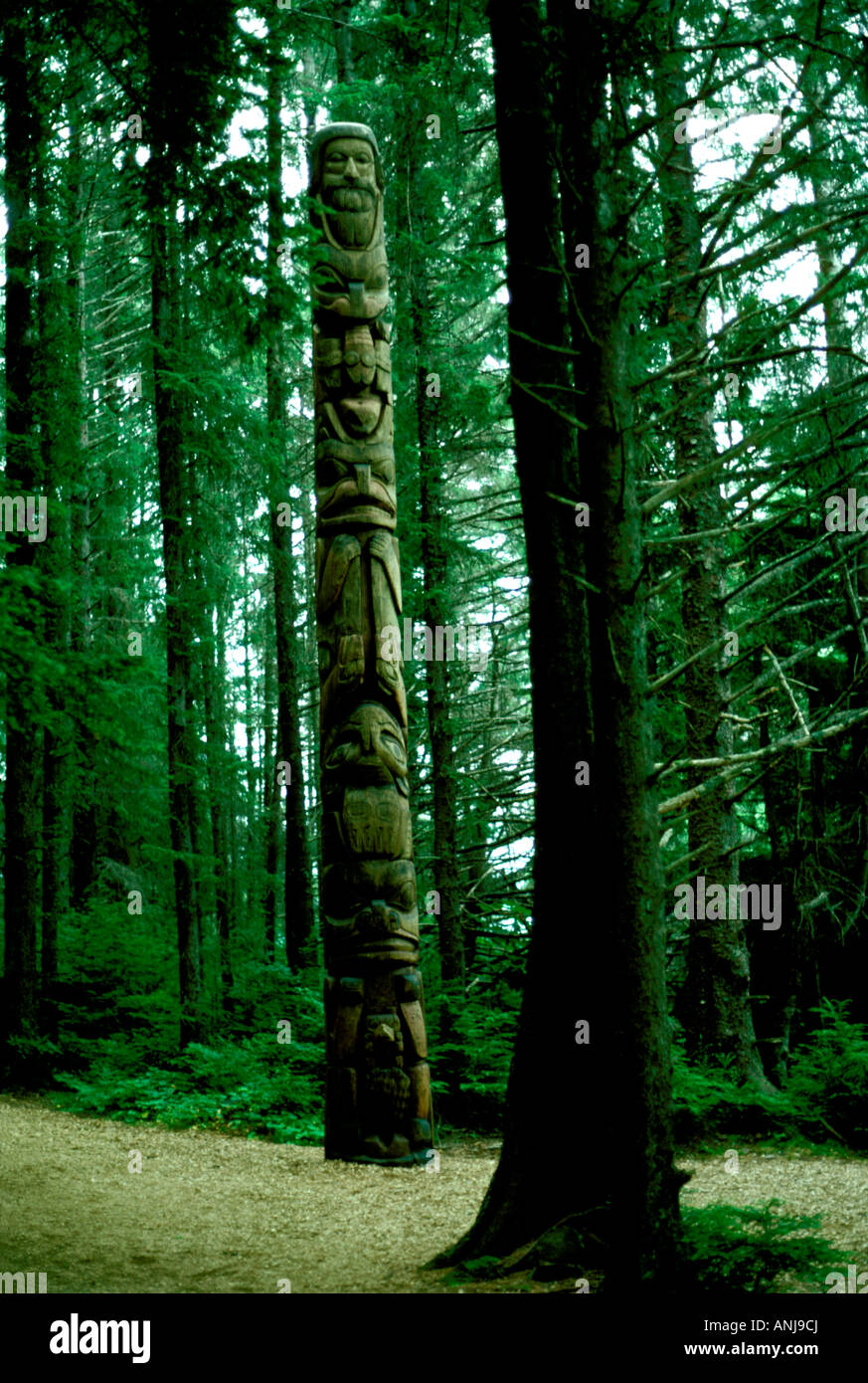 AK Alaska Sitka National Historic Park totem pole in rain forest ...