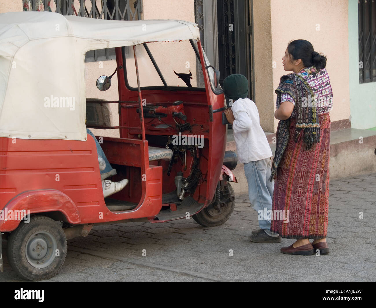 Three wheeld taxis made in India in use Stock Photo - Alamy