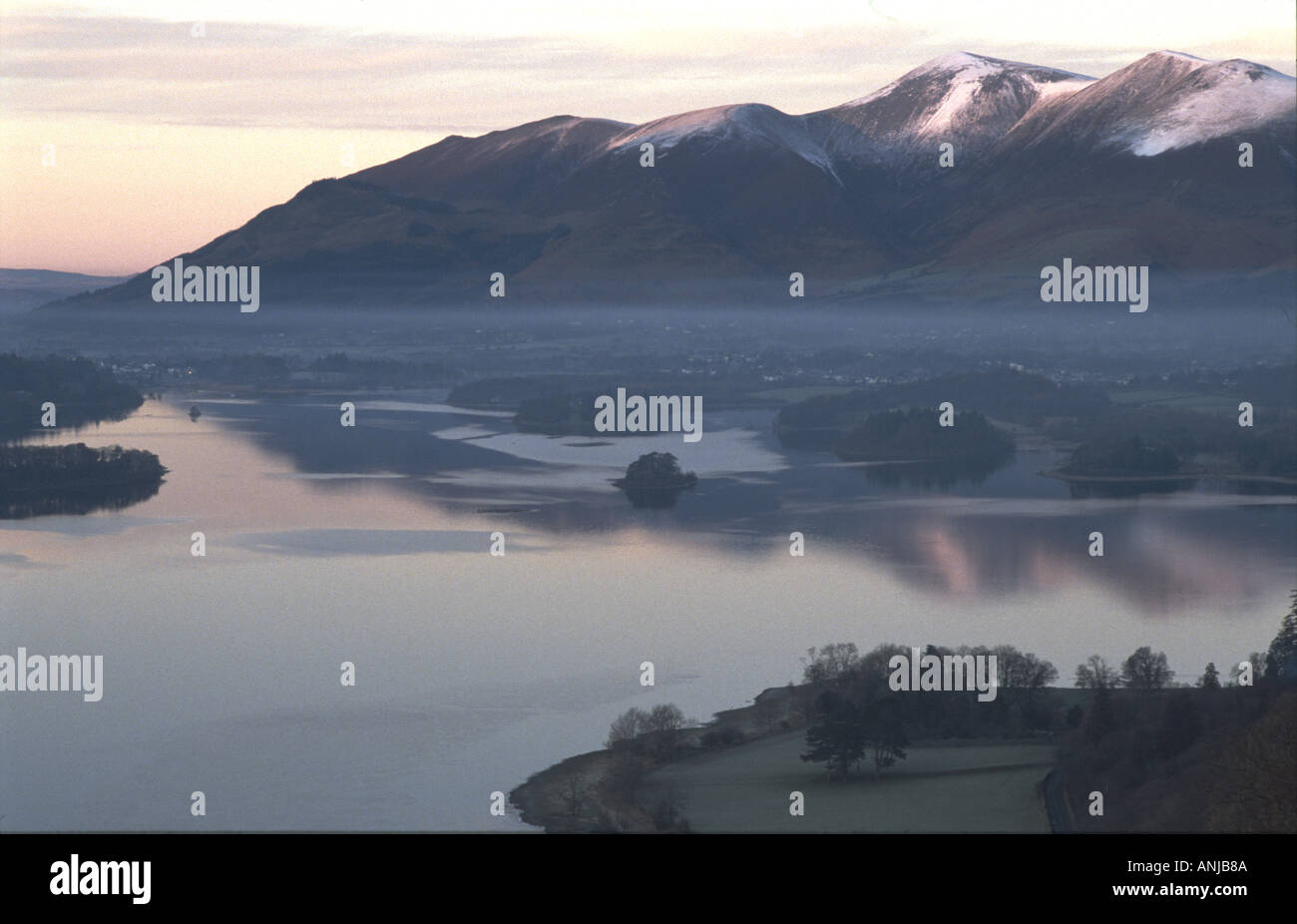 Derwent Water and Skiddaw in the English Lake District shrouded in mist ...