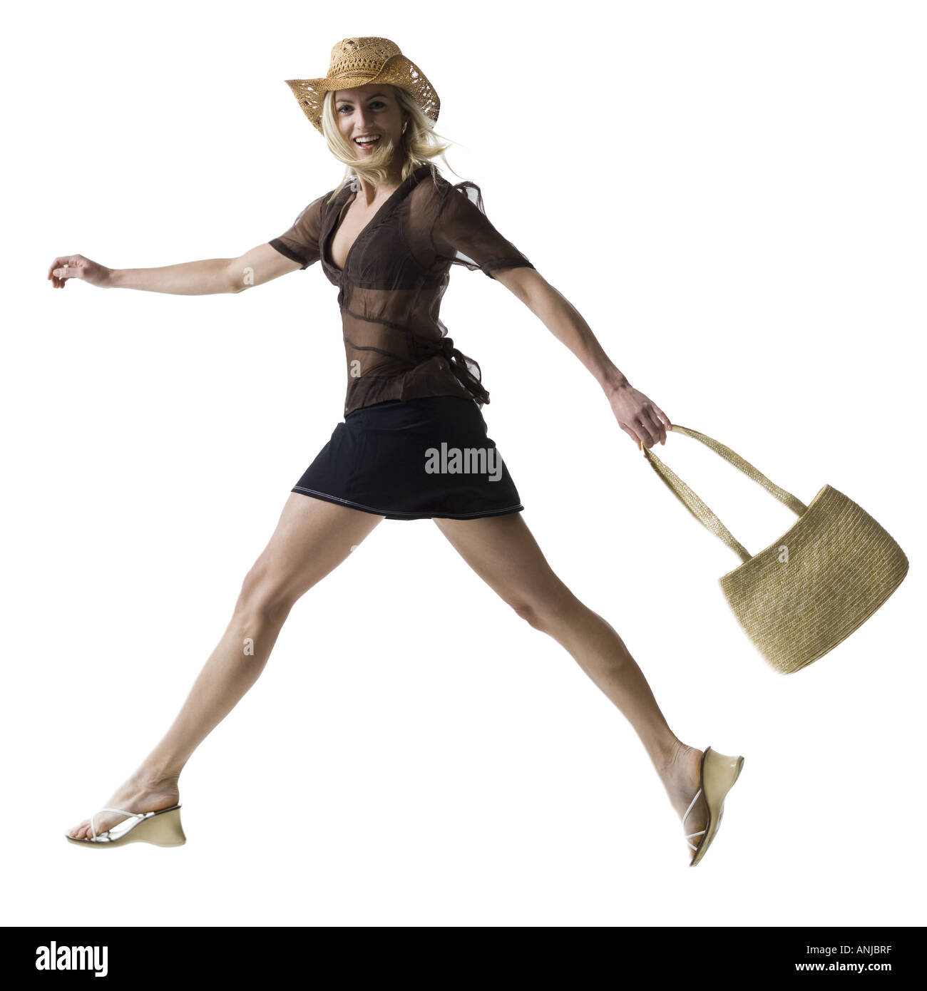 Portrait of a young woman walking Stock Photo - Alamy