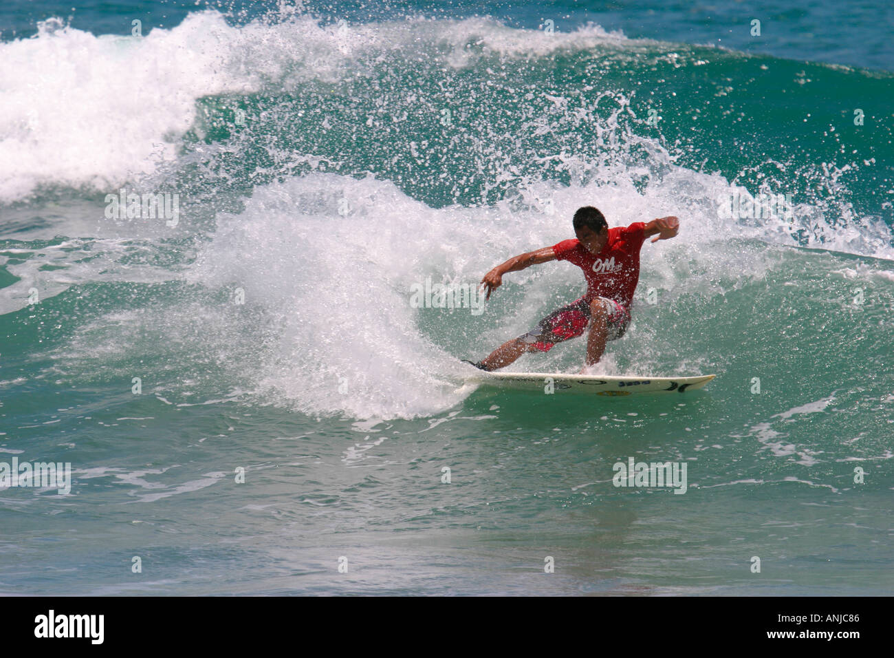 Dede Suryana indonesian surfer doing a turn called a cut back on a ...