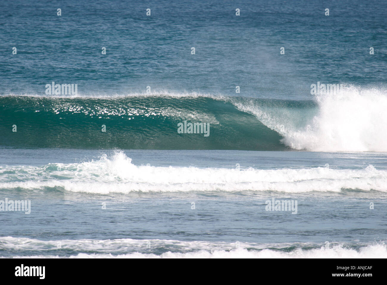 empty perfect and very dangerous wave beaking in inches of water Stock ...