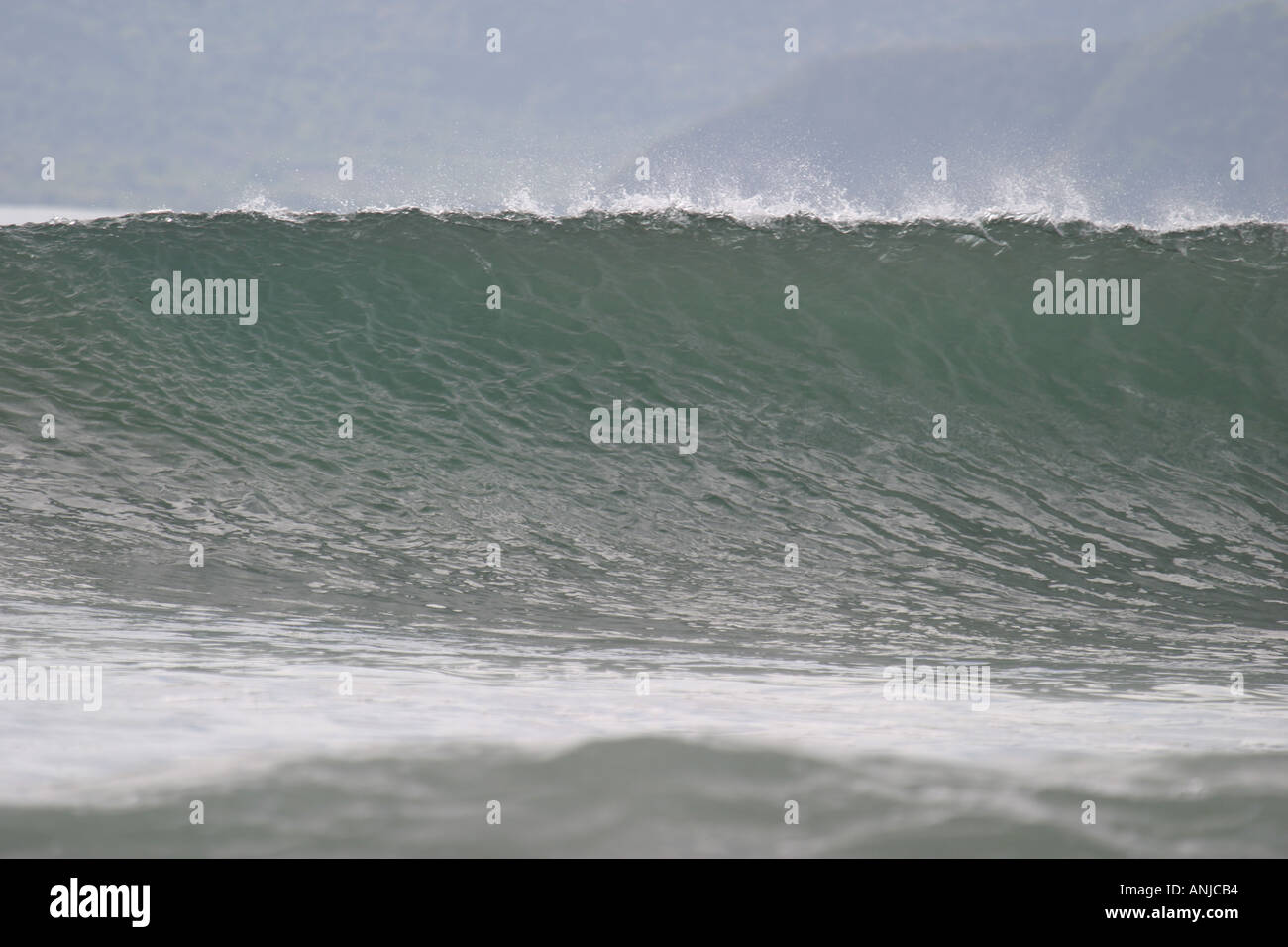 empty wave standing up feathering greasy looking glass like water Stock ...