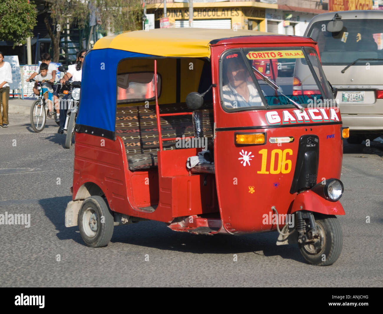 Three wheeld taxis made in India in use Stock Photo - Alamy