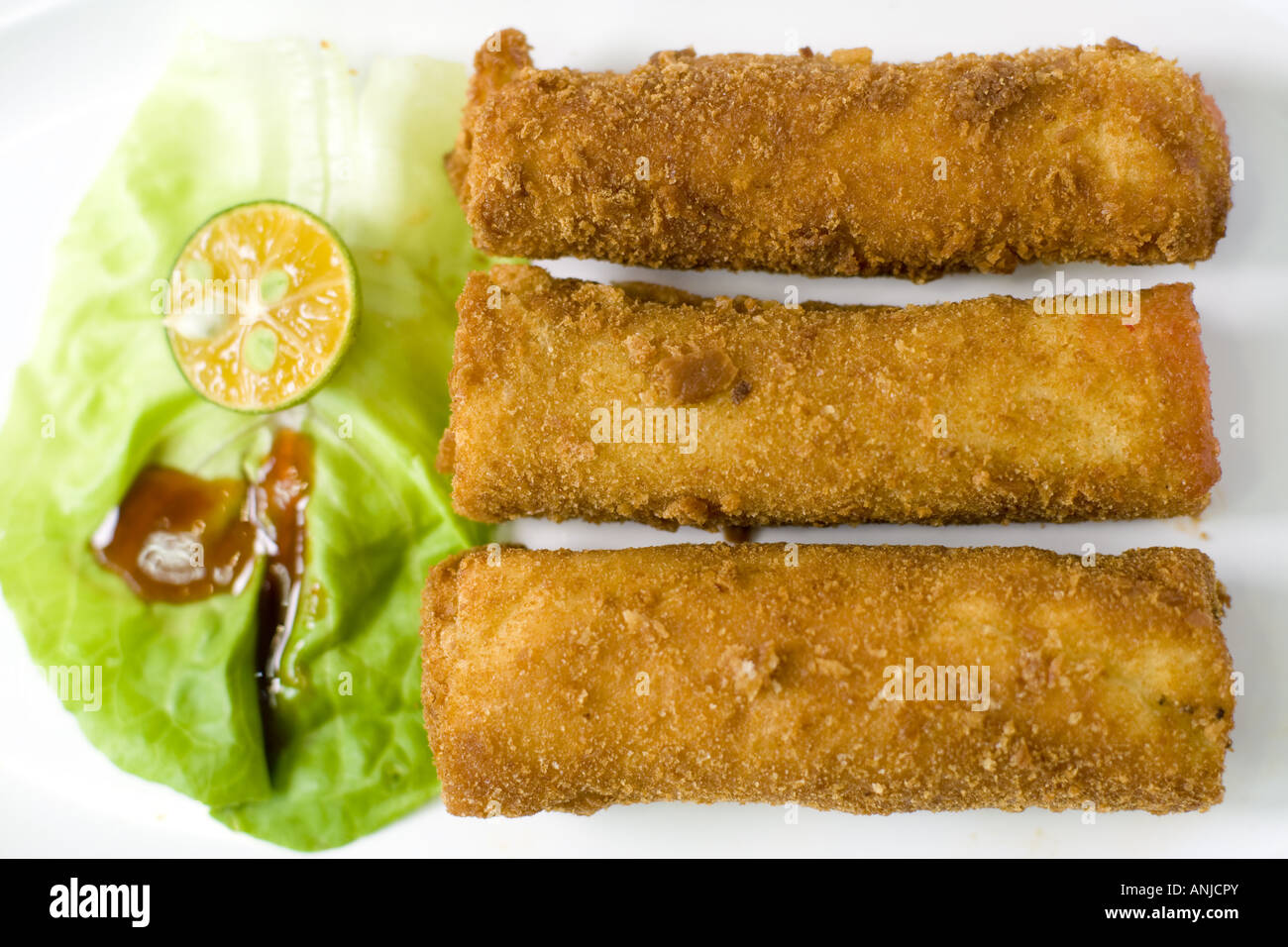 Malaysian deep-fried fish rolls Stock Photo - Alamy