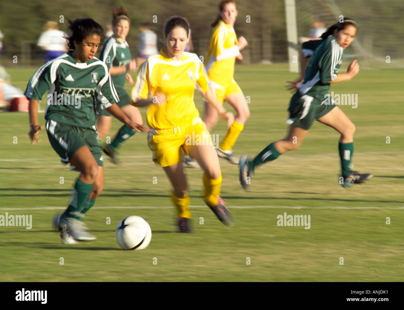 action of teenage girls soccer match Stock Photo - Alamy
