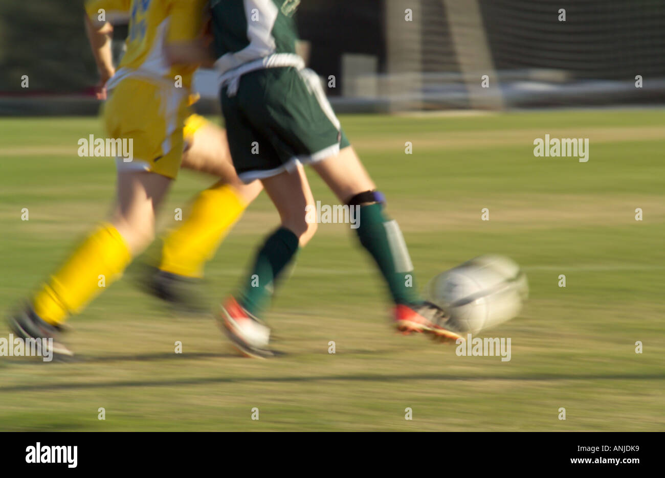 Blur action of teenage girls soccer match Stock Photo - Alamy