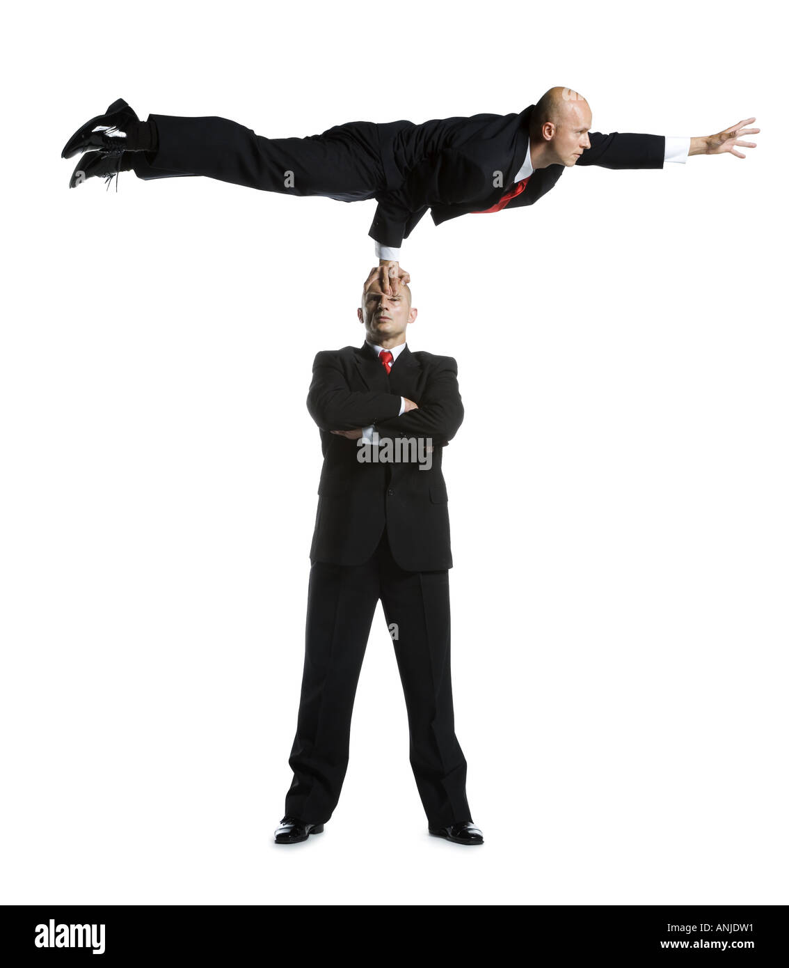 Acrobat standing arms crossed hi-res stock photography and images - Alamy