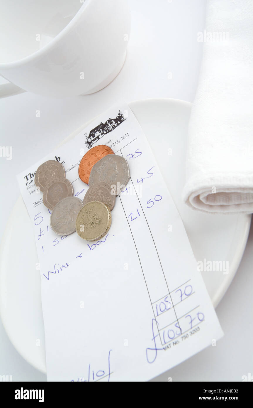 leaving a tip in a restaurant Stock Photo - Alamy