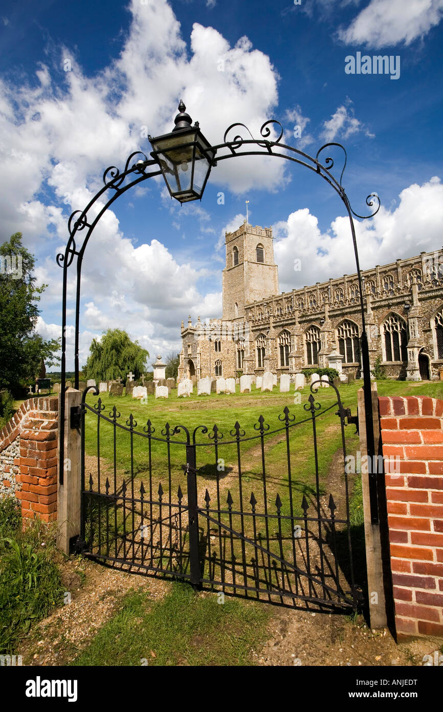 UK Suffolk Blythburgh village Holy Trinity Church from gate into ...