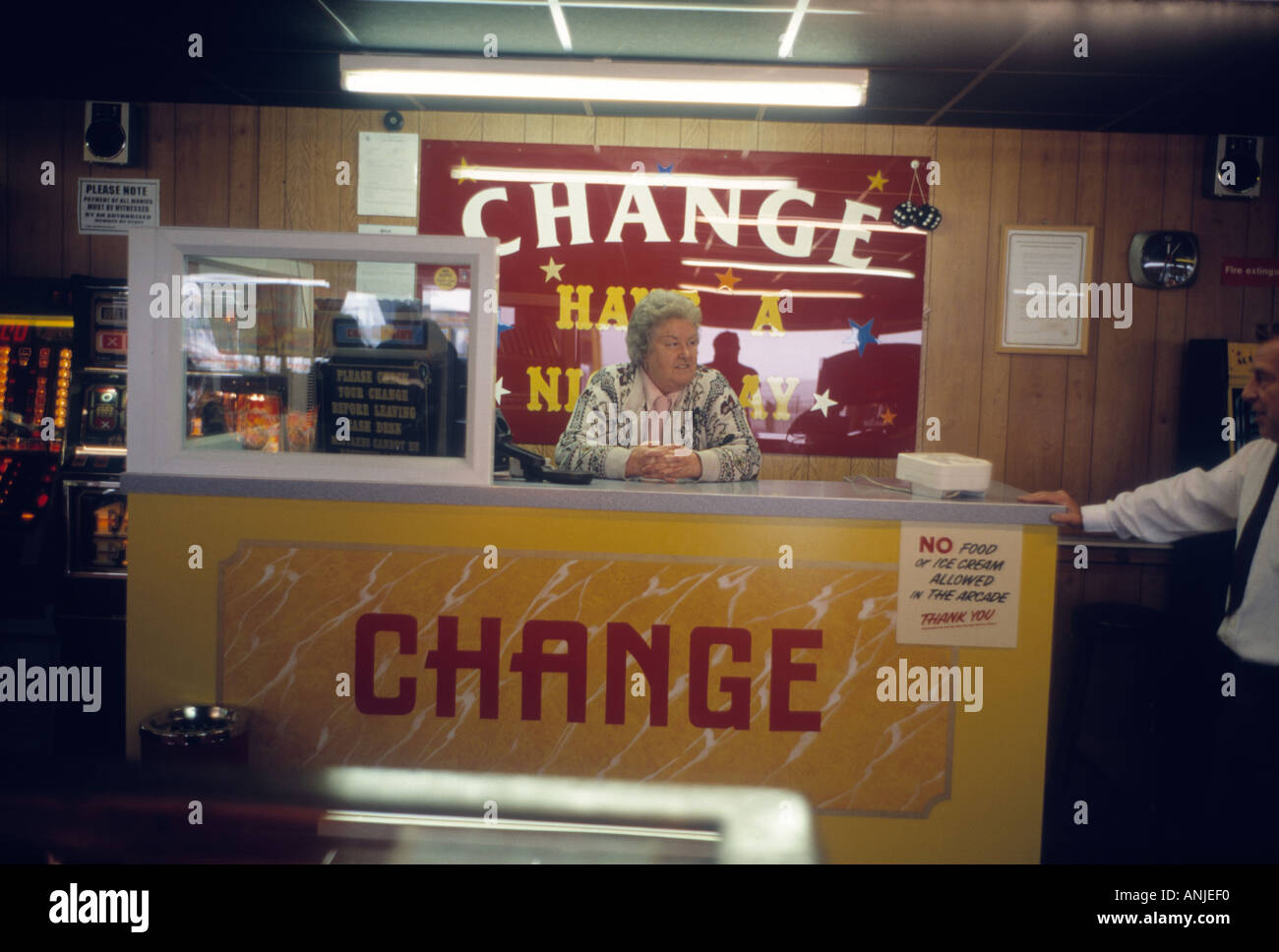 A change counter in an amusement arcade in Walton on the Naze Essex UK ...