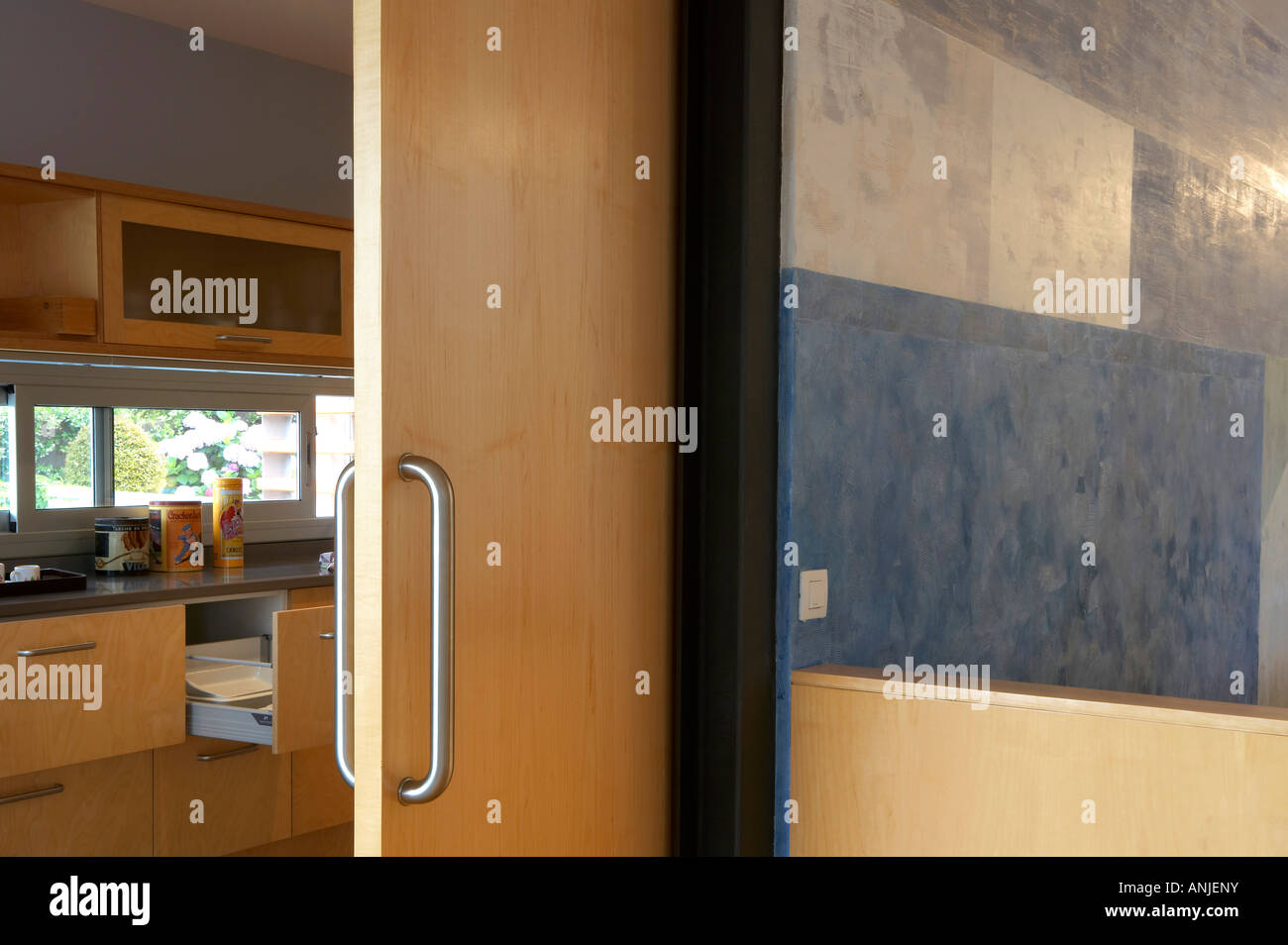 Open door leading to kitchen Stock Photo - Alamy