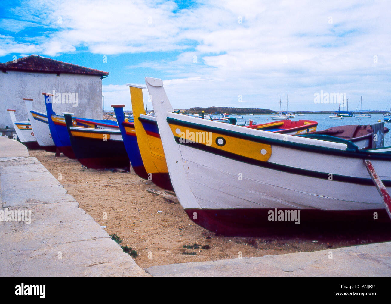 Fishing boats at rest Alvor harbour Algarve Portugal Stock Photo - Alamy