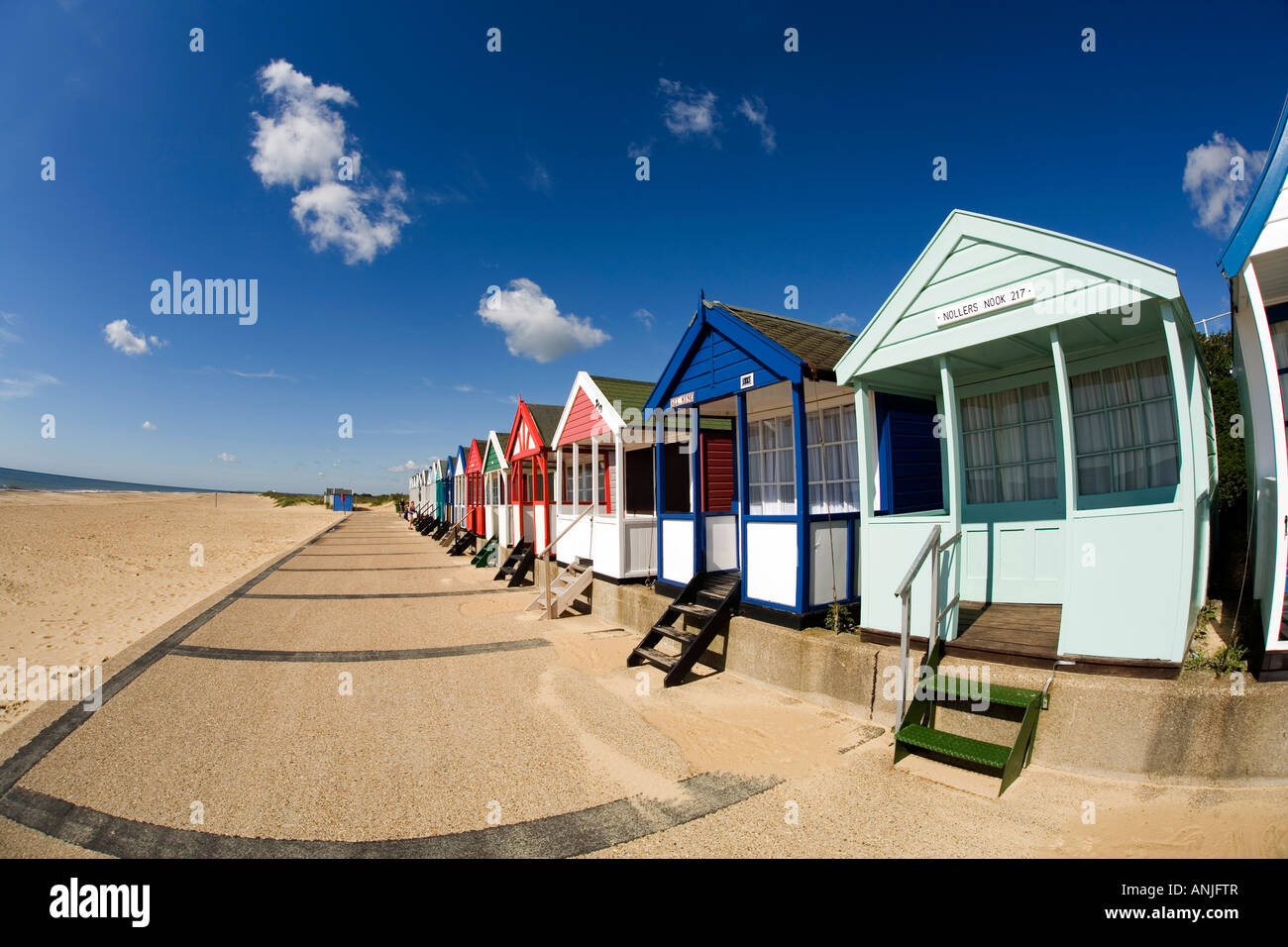 Brightly painted beach huts southwold hi-res stock photography and ...