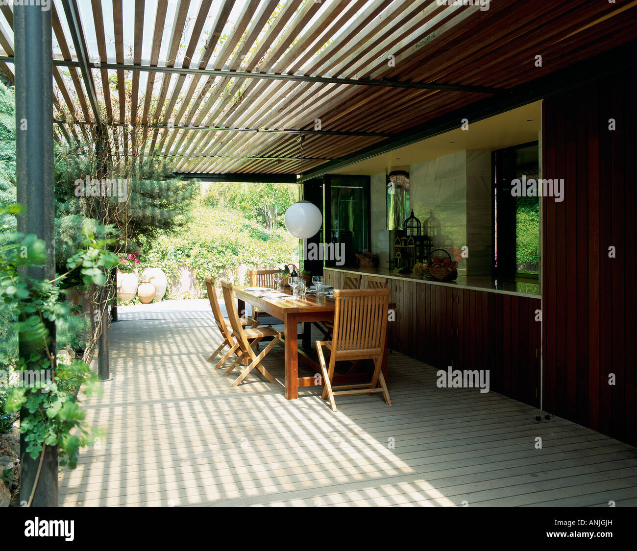 View of a dining area in a lanai Stock Photo - Alamy
