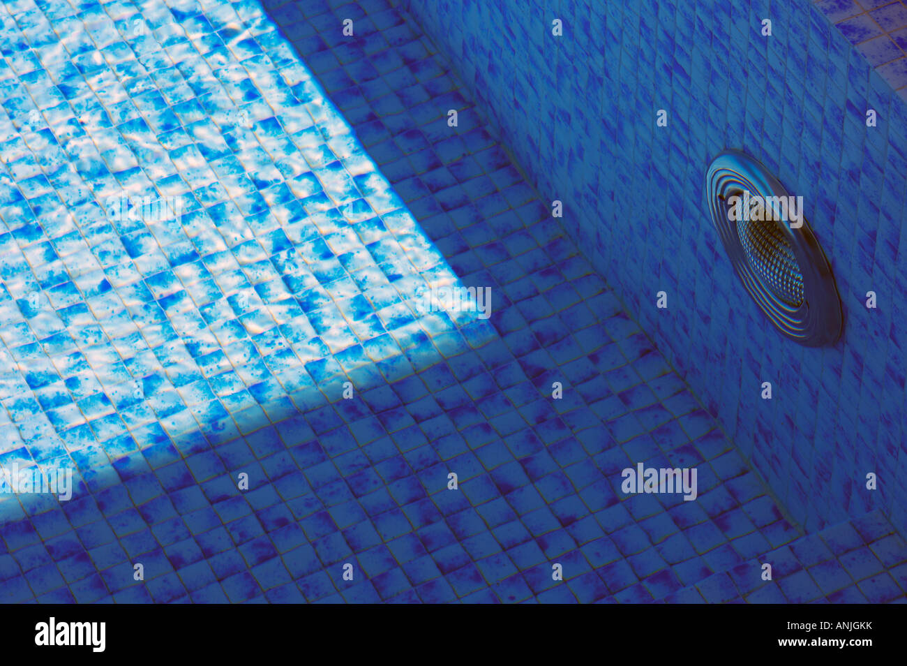 Empty swimming pool with tile flooring Stock Photo - Alamy