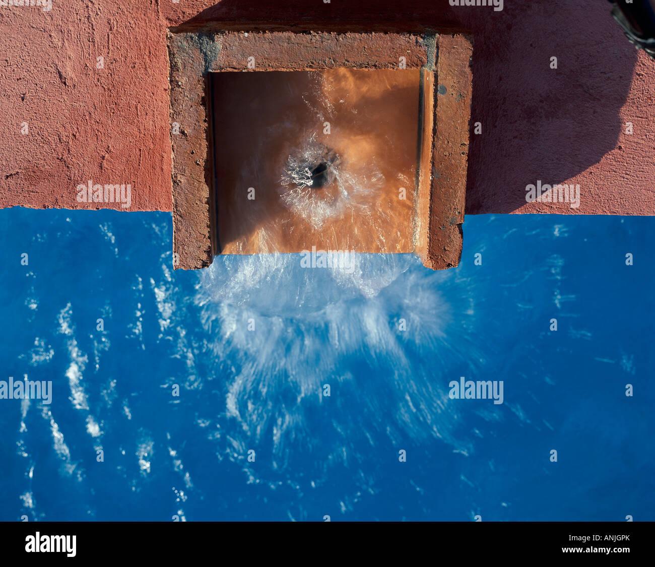 Close up of a water outlet in a swimming pool Stock Photo - Alamy
