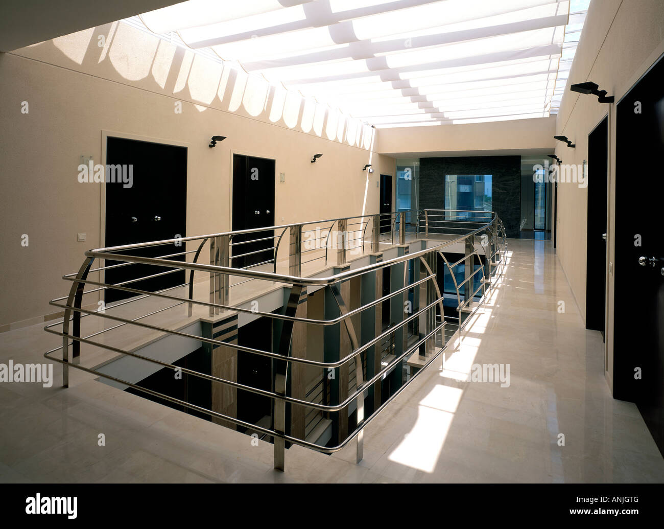 View of a corridor with a bright skylight Stock Photo - Alamy