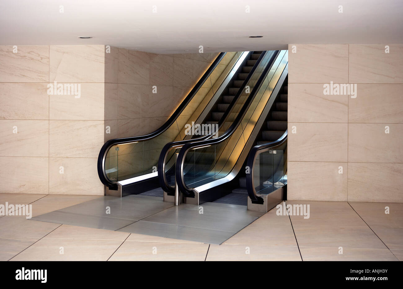 View of an access to a building trought an escalators Stock Photo - Alamy