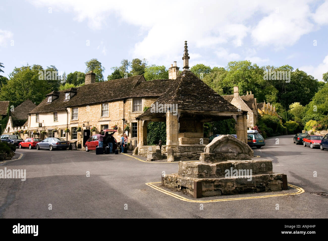 UK Wiltshire Castle Combe village Market Place Butter Cross Castle Inn ...