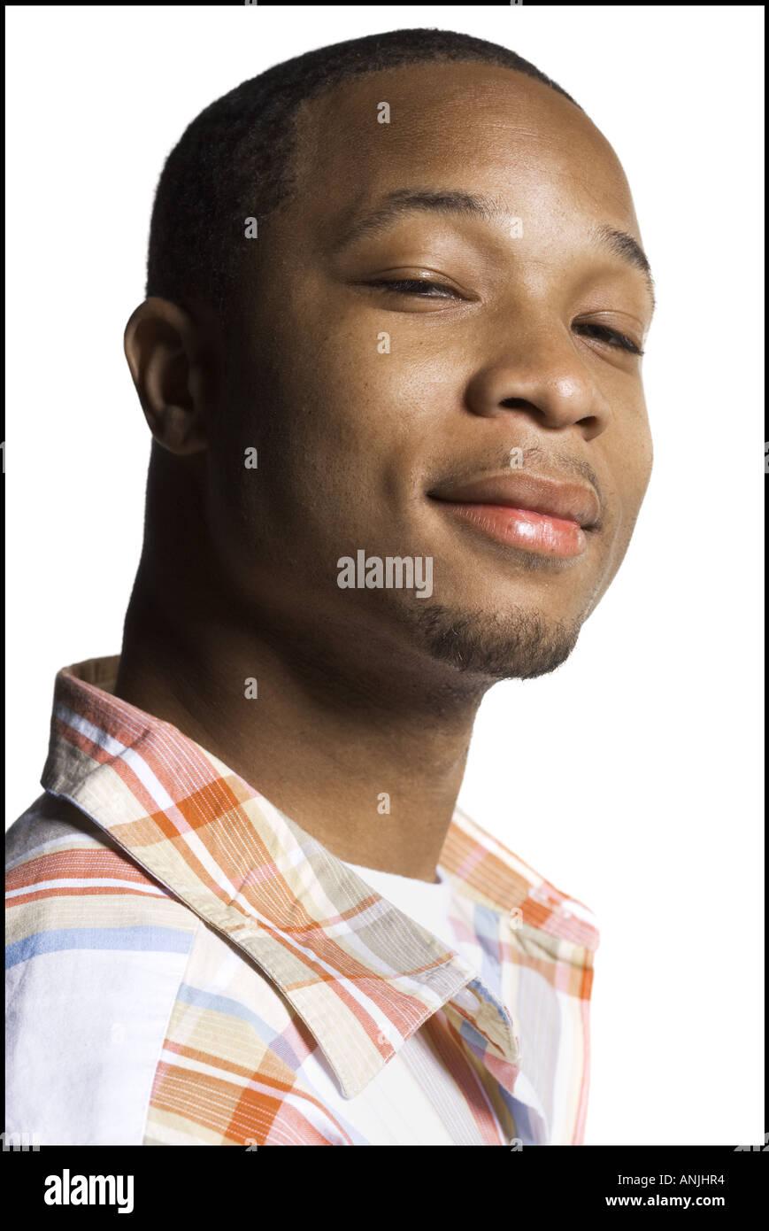 Side profile of a young man smiling Stock Photo - Alamy