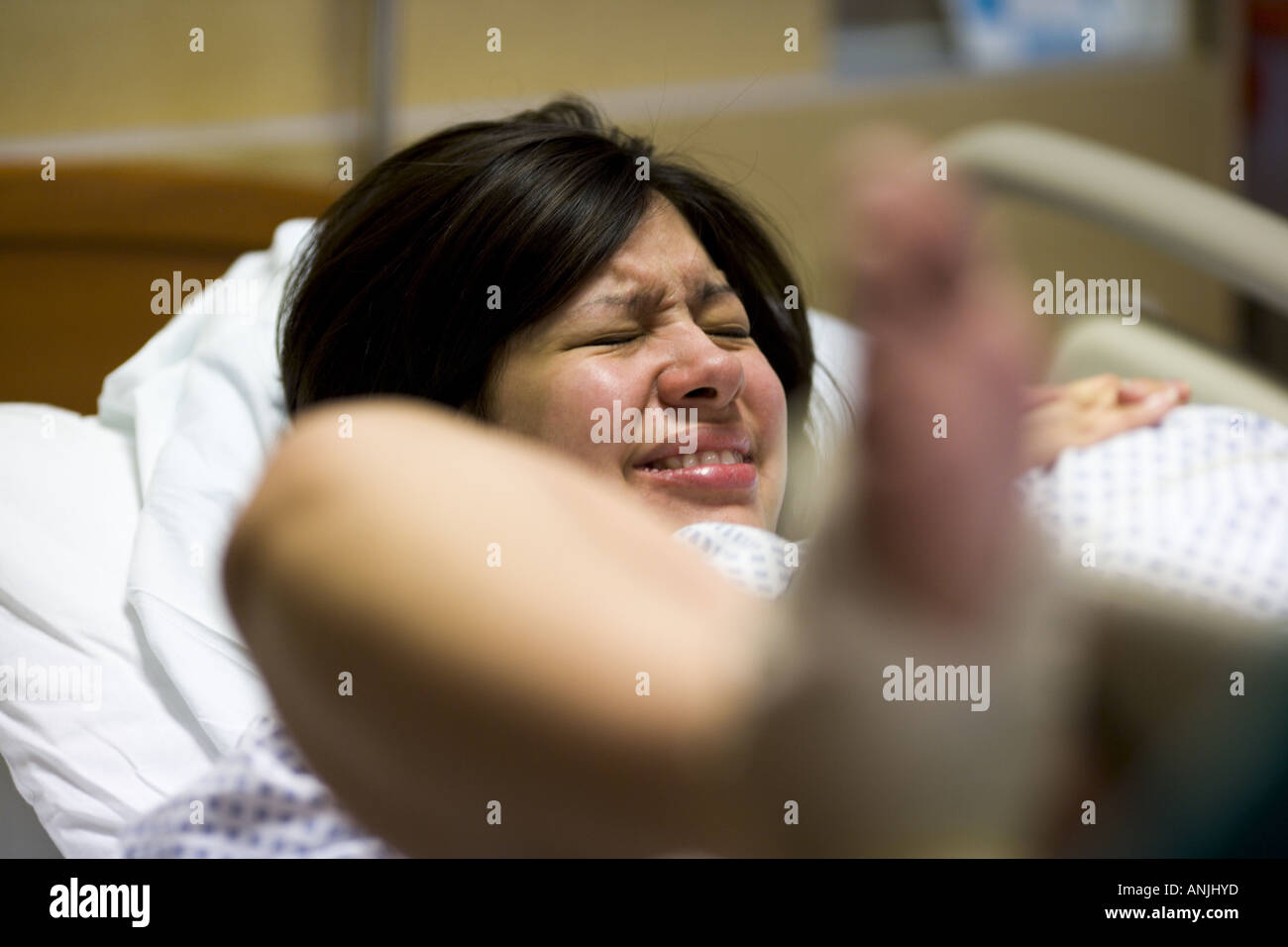 Female patient in labor Stock Photo - Alamy