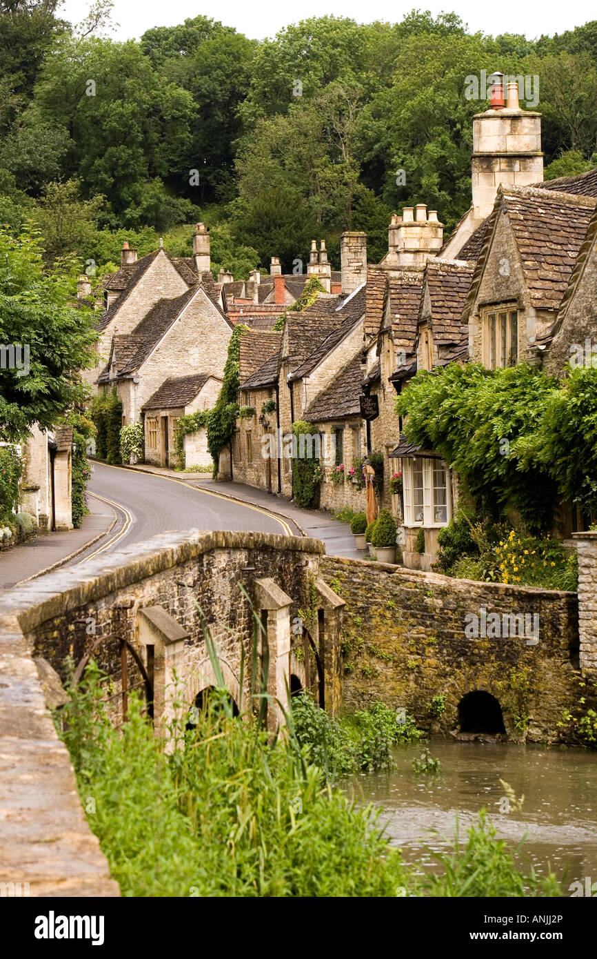 UK Wiltshire Castle Combe High Street and bridge over Bybrook Stock ...