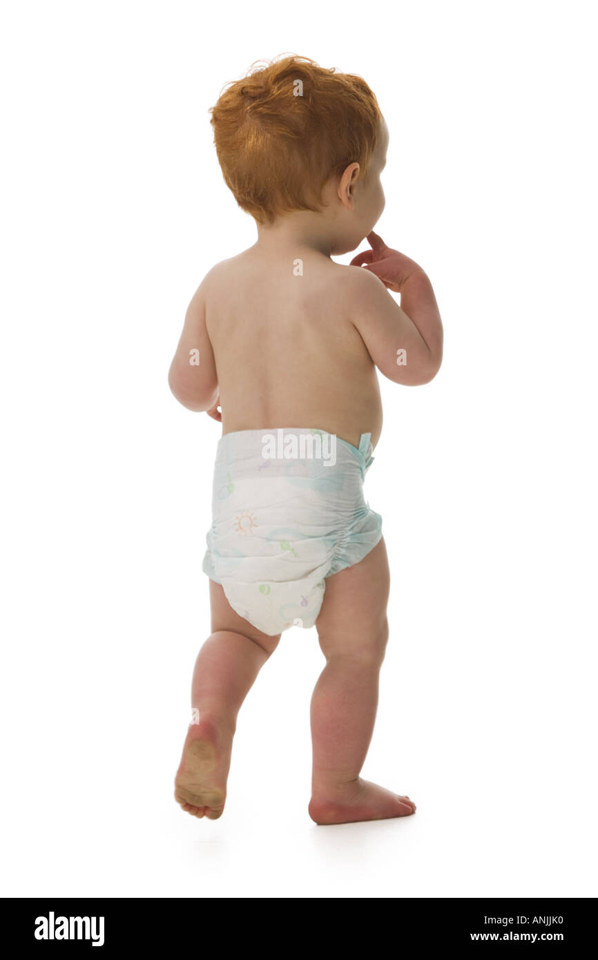 Rear view of a baby boy walking Stock Photo - Alamy