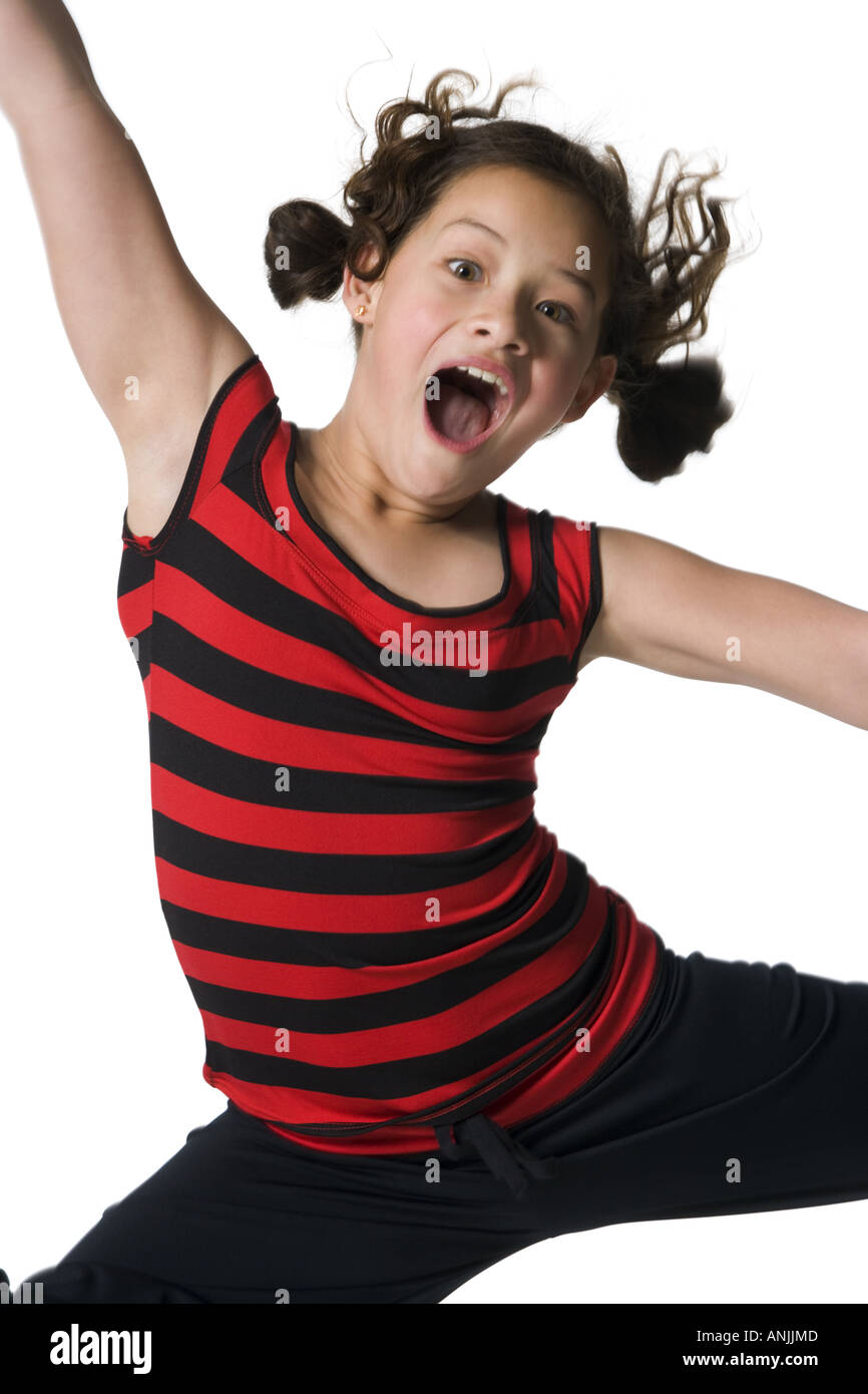Portrait of a girl jumping with her arms outstretched Stock Photo - Alamy