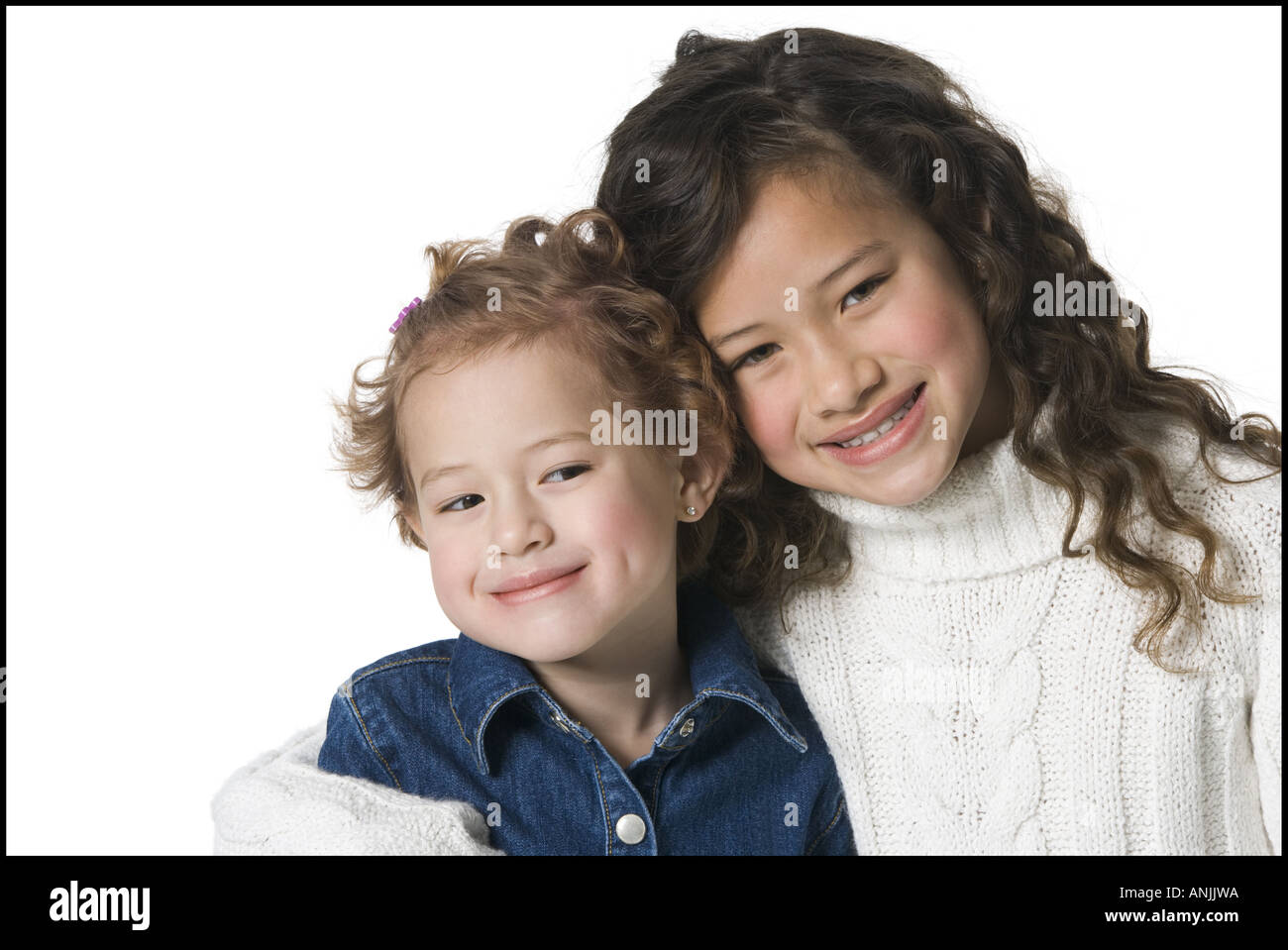 Portrait of two sisters smiling Stock Photo - Alamy
