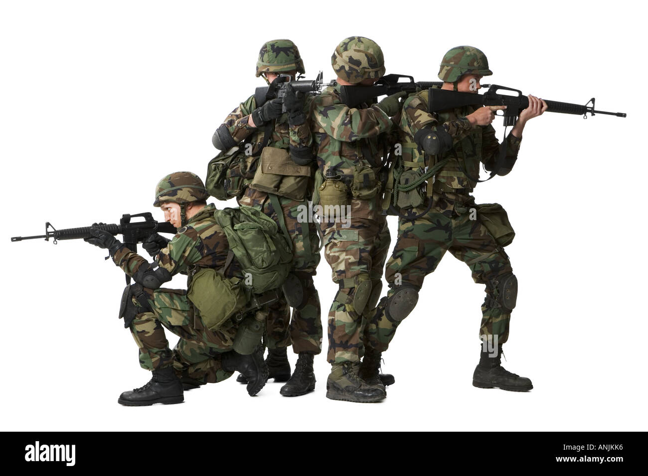 Four soldiers aiming rifles Cut Out Stock Images & Pictures - Alamy