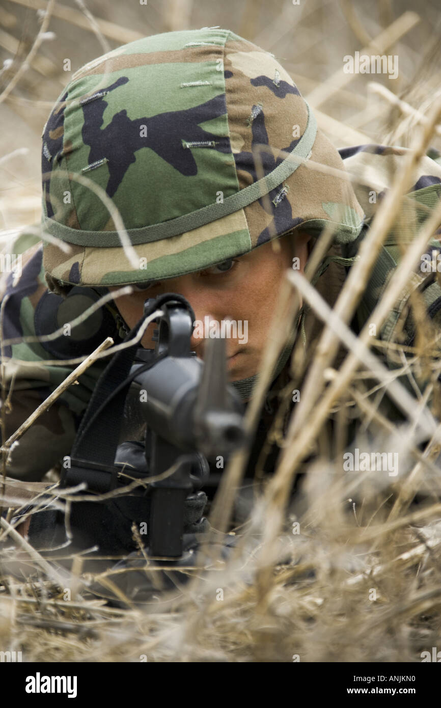 Close up of a soldier aiming his rifle Stock Photo - Alamy