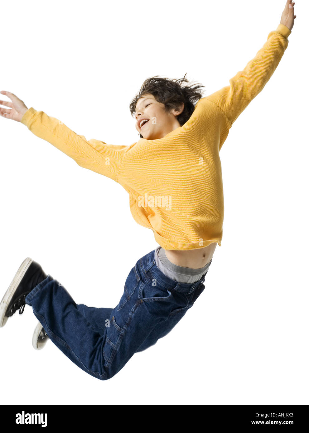 Close up of a boy jumping Stock Photo - Alamy