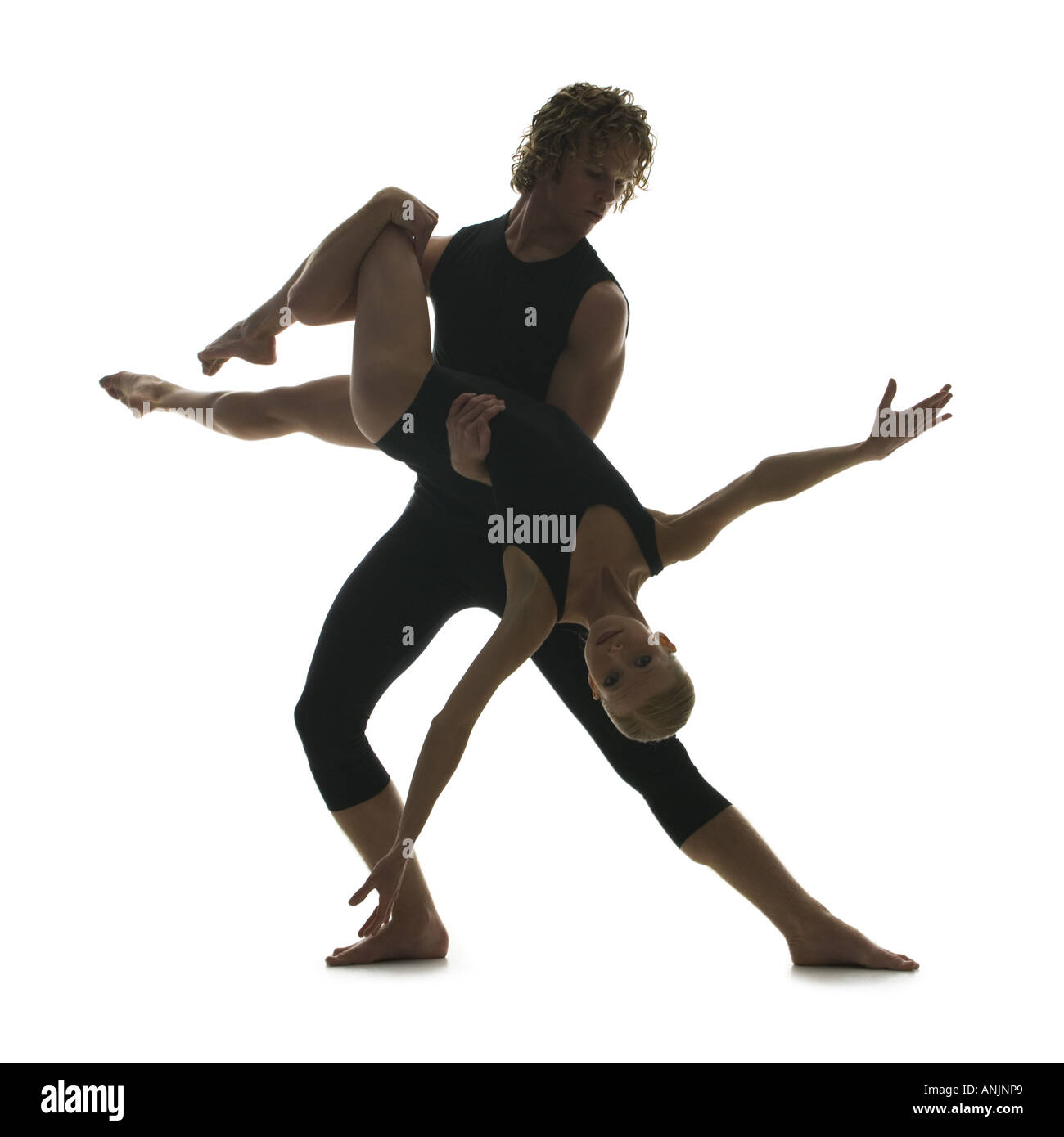 Male dancer stretching arm hi-res stock photography and images - Alamy