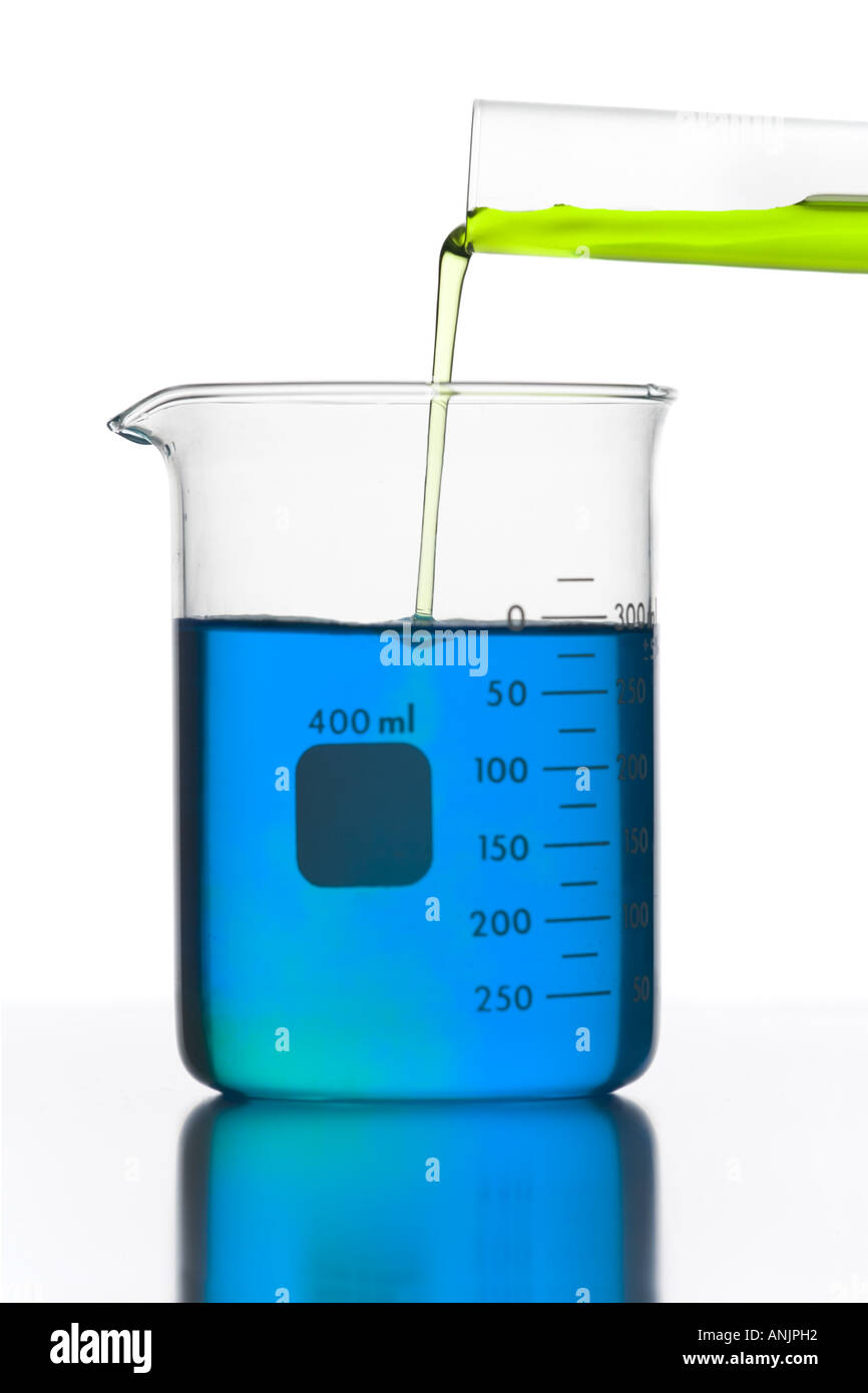 Liquid being dropped into a beaker with a pipette Stock Photo - Alamy