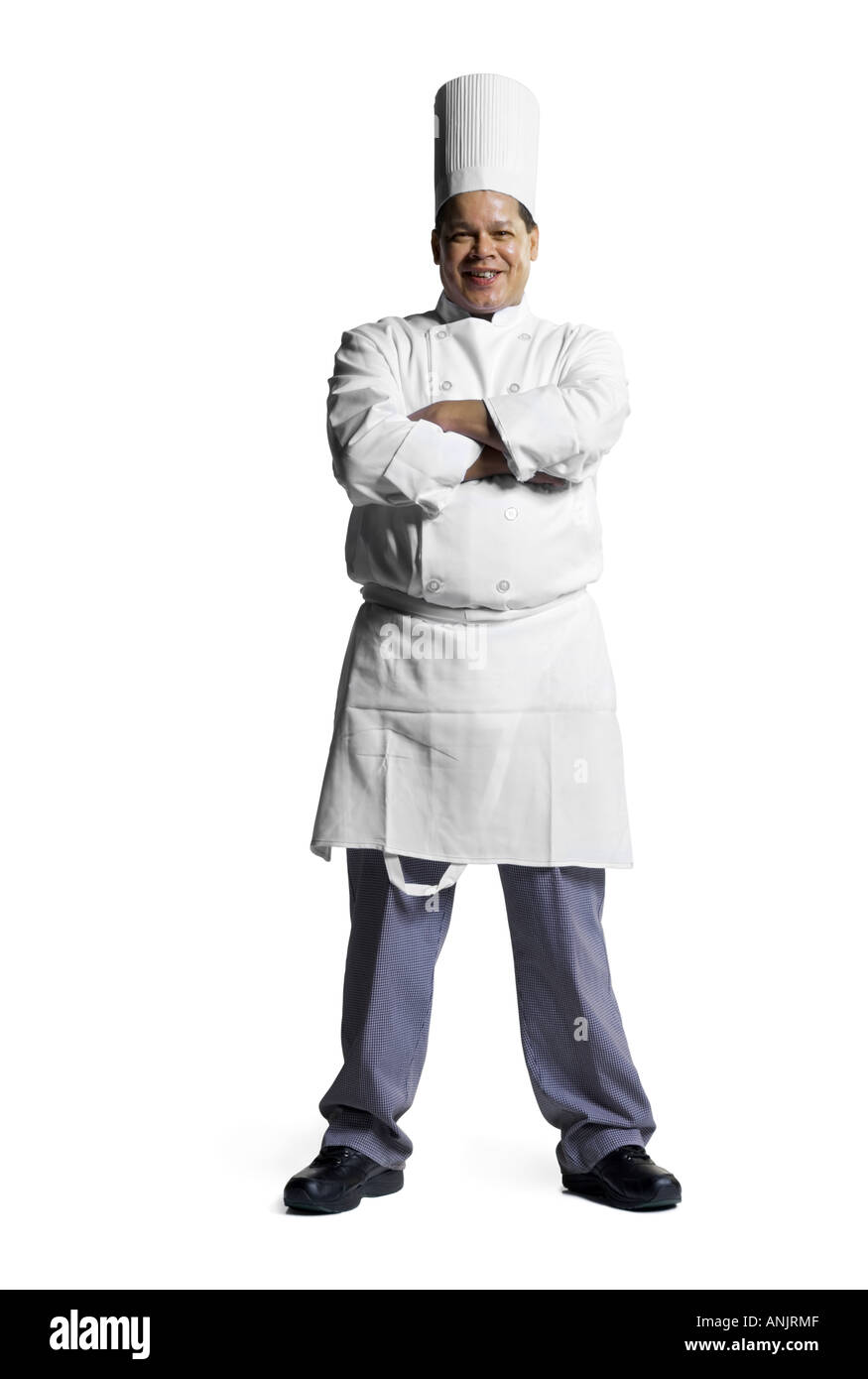 Portrait of a male chef standing with his arms folded Stock Photo - Alamy